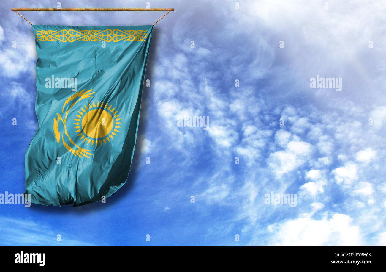 Flag of Kazakhstan. Vertical flag, against blue sky with place for your ...