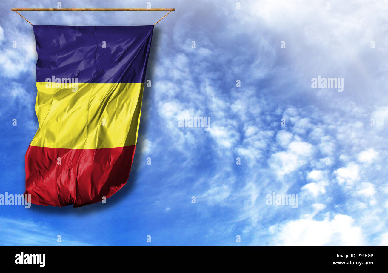 Flag of Romania. Vertical flag, against blue sky with place for your ...
