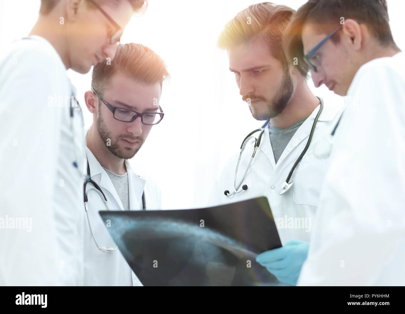 group of radiologists discussing x-ray Stock Photo - Alamy