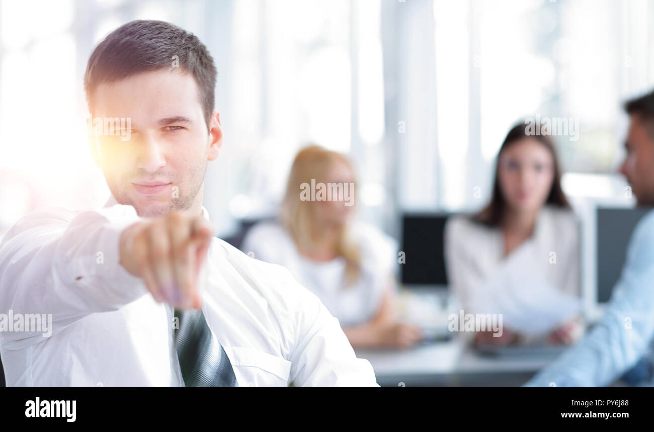 concept of perspective.confident businessman pointing forward Stock ...