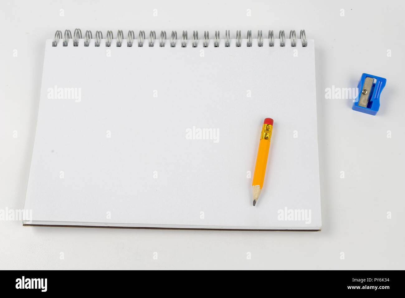 Notebook for taking notes and pencil on the office table. Accessories ...