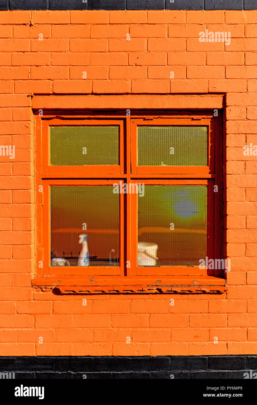 sunrise reflections in windows Stock Photo - Alamy