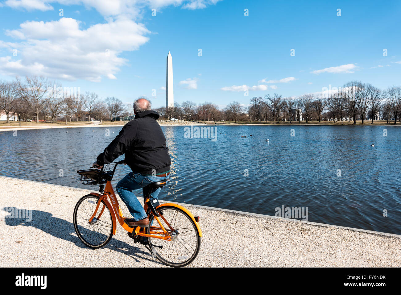 Washington DC, USA - March 9, 2018: Monument, reflection during sunny ...