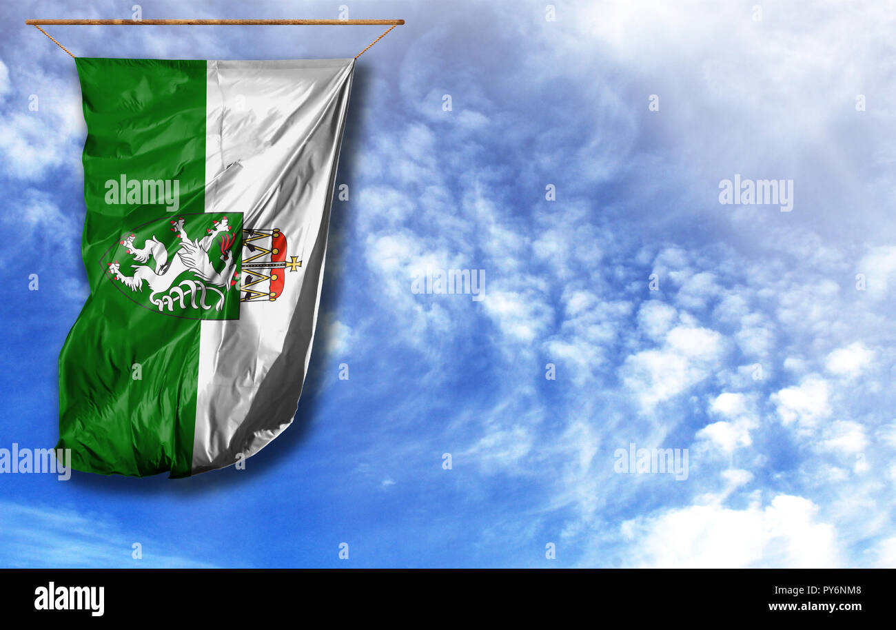 Flag of Styria. Vertical flag, against blue sky with place for your ...
