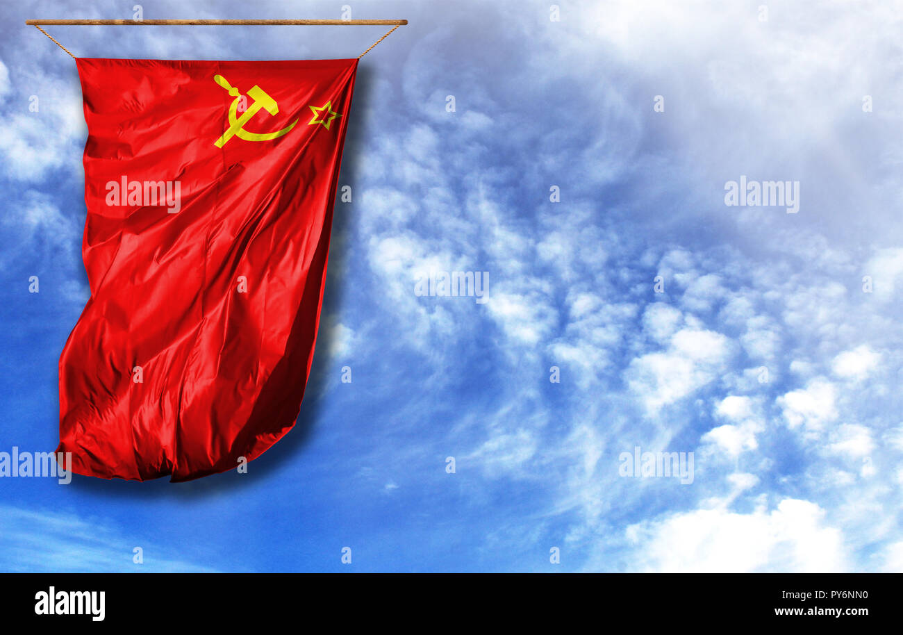 Flag of USSR. Vertical flag, against blue sky with place for your text ...