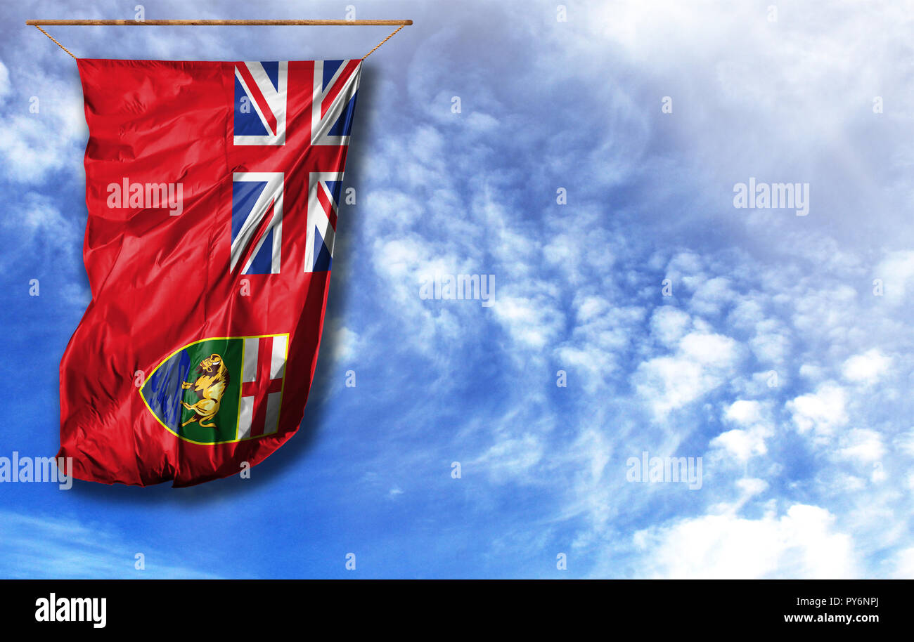 Flag of Manitoba. Vertical flag, against blue sky with place for your ...