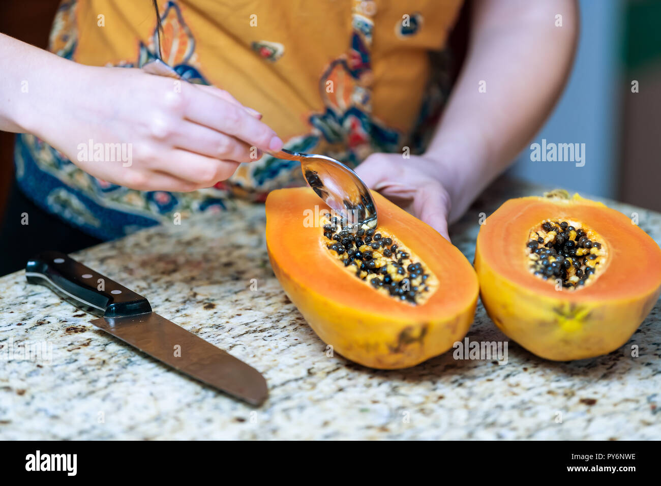 Removing seeds hi-res stock photography and images - Alamy