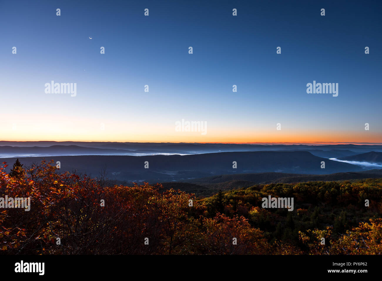 Bear rocks overlook during sunrise, dawn, moon in autumn with rocky ...