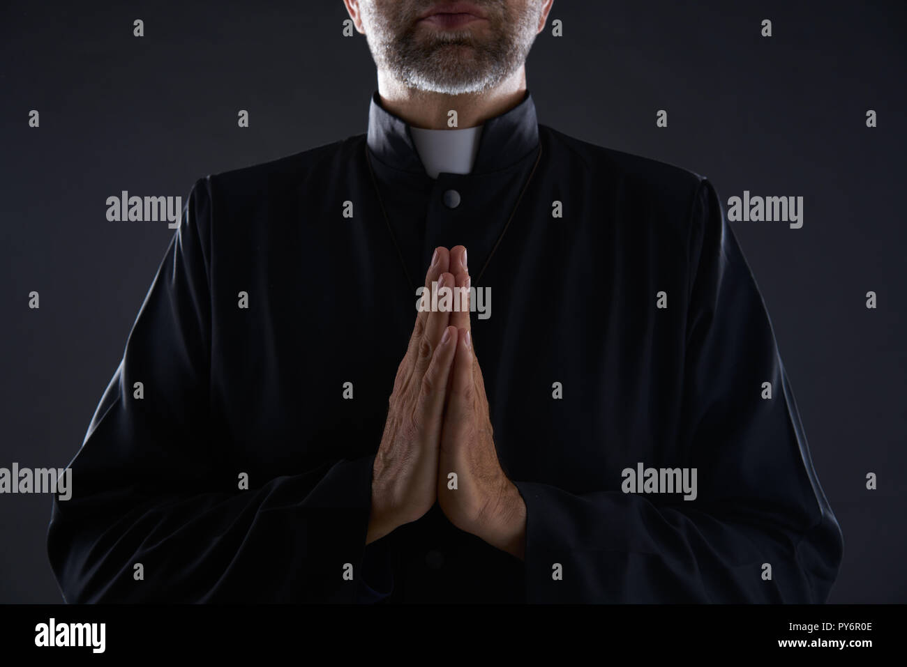 Catholic priest confession black white hi-res stock photography and ...