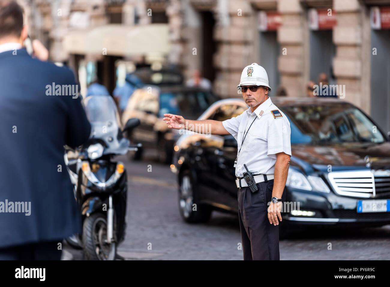 Traffic policeman directing traffic in rome hi-res stock photography ...