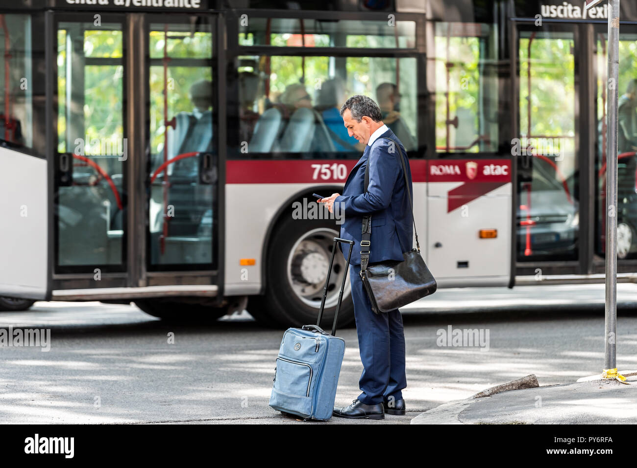 Person standing waiting for bus hi-res stock photography and images - Alamy