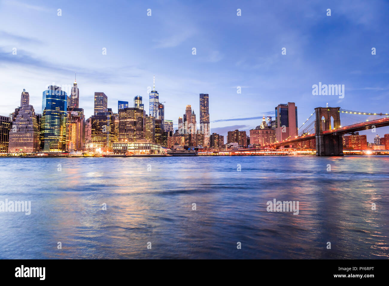 Wide angle view on NYC New York City Brooklyn Bridge Park by east river ...