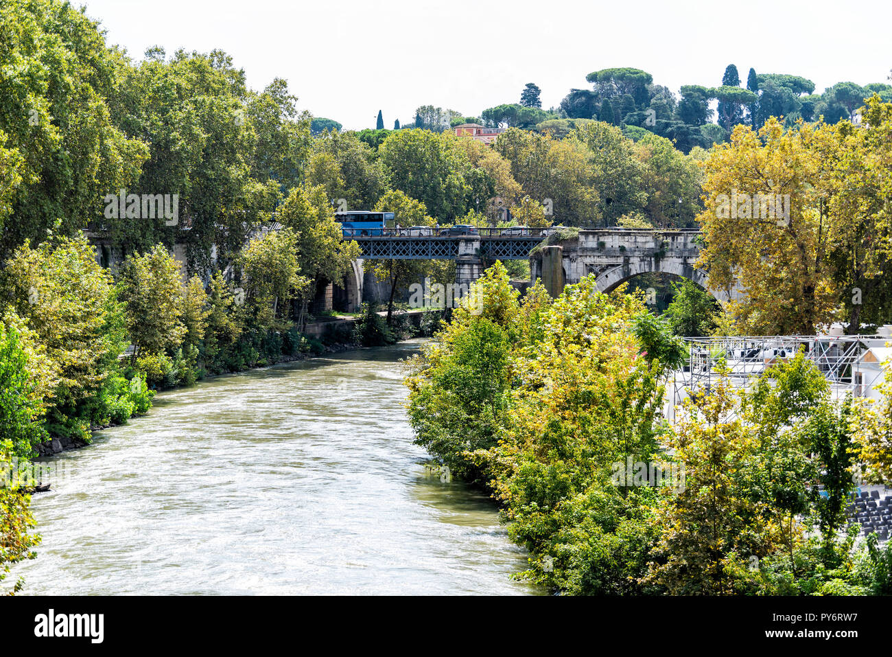 Rome, Italy Roma Roman Tiber river, colorful green summer trees in park ...