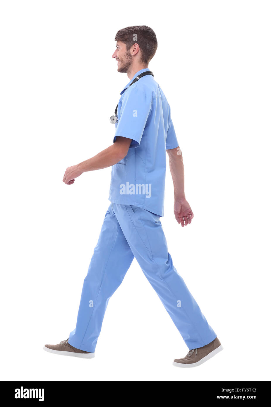 side view.medical doctor confidently stepping forward Stock Photo - Alamy