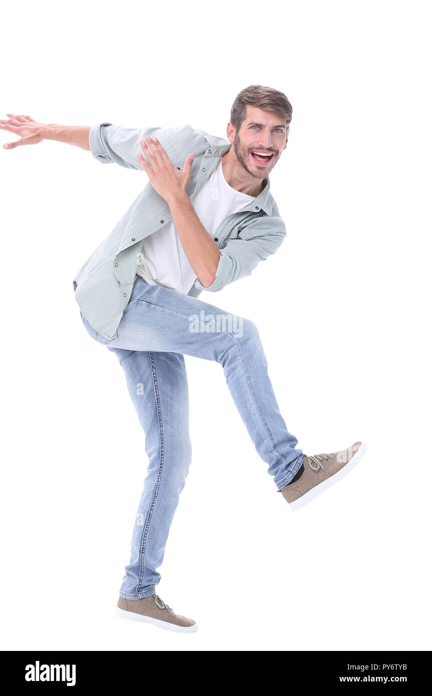 full-length. a happy modern man steps forward Stock Photo - Alamy
