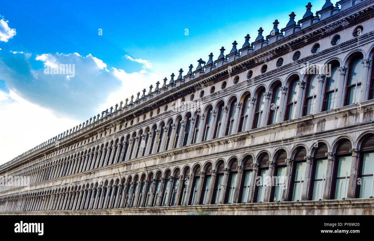 Repeating arches of an old building Stock Photo - Alamy