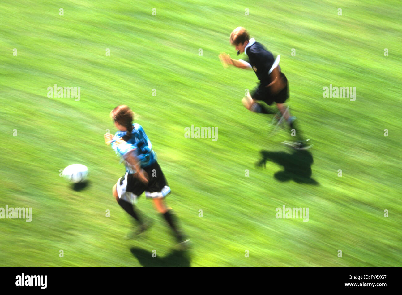 Youth soccer game with girl player and boy referee, USA Stock Photo - Alamy