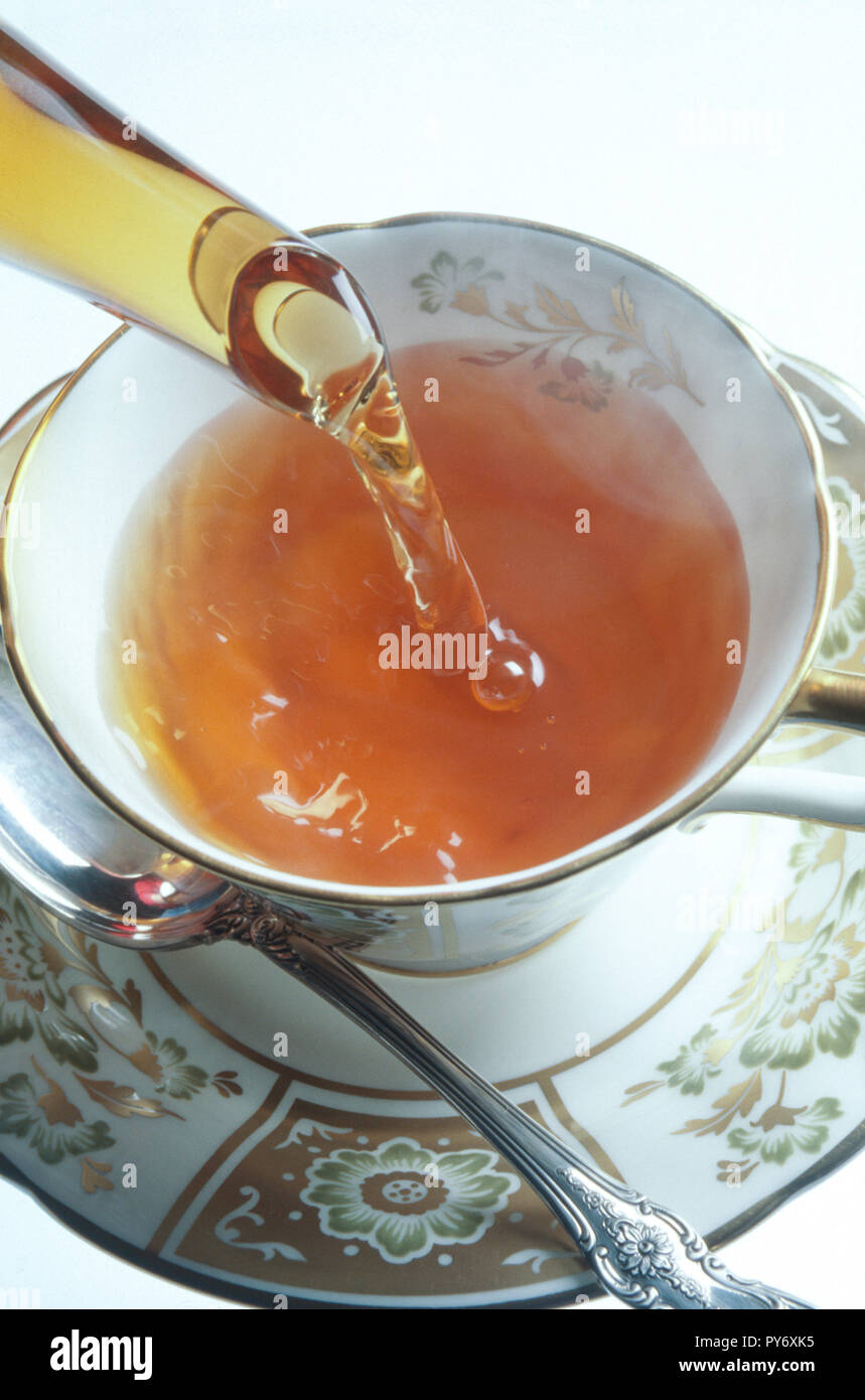 Pouring Tea into China Teacup (Series of 4 Stock Photo - Alamy