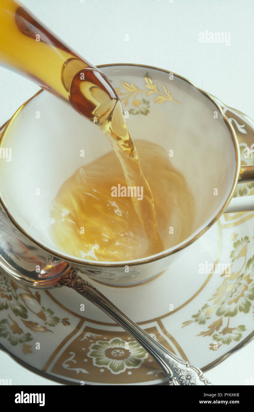 Pouring Tea into China Teacup (Series of 4 Stock Photo - Alamy