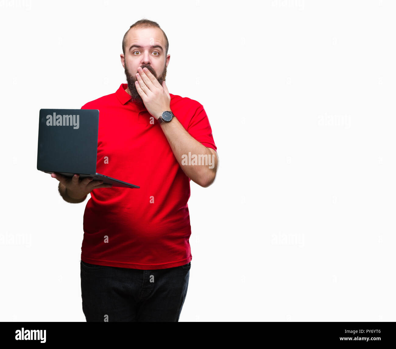 Young caucasian man using computer laptop over isolated background ...