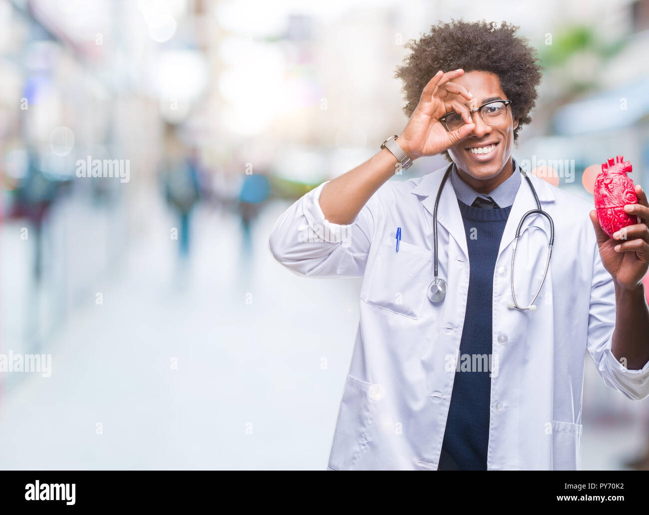 Afro american cardiologist doctor man over isolated background with ...