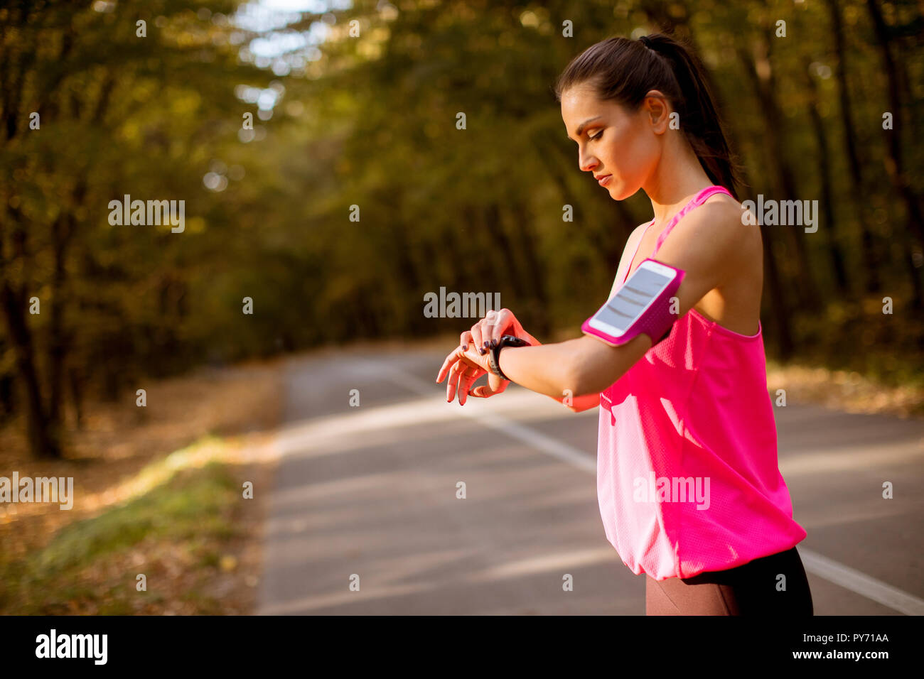 Female runner during outdoor workout in beautiful autumn mountain ...