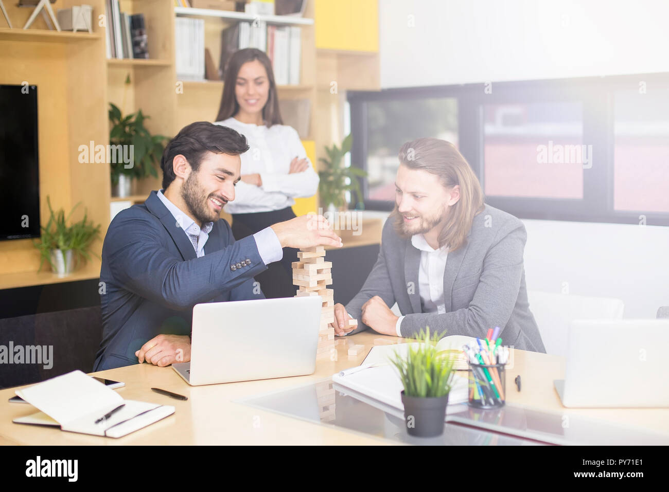 Cheerfull business team working together to achieve better results ...