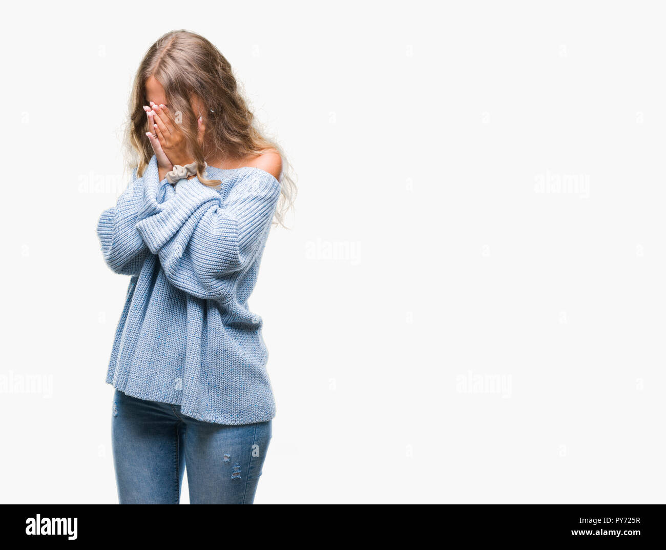 Beautiful young blonde woman wearing winter sweater over isolated ...