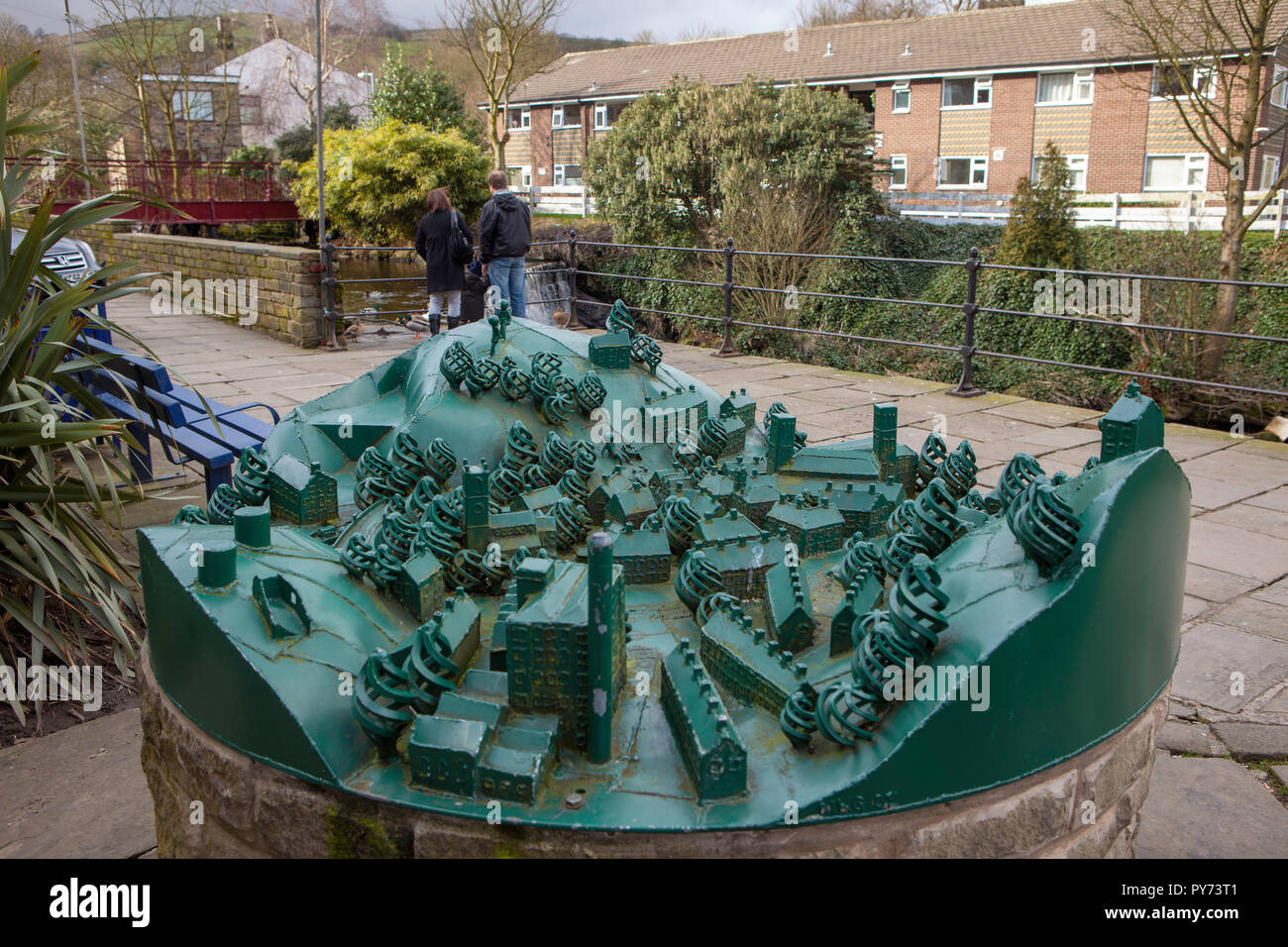 Sculpture located next to the canal in the centre of Marsden in West ...