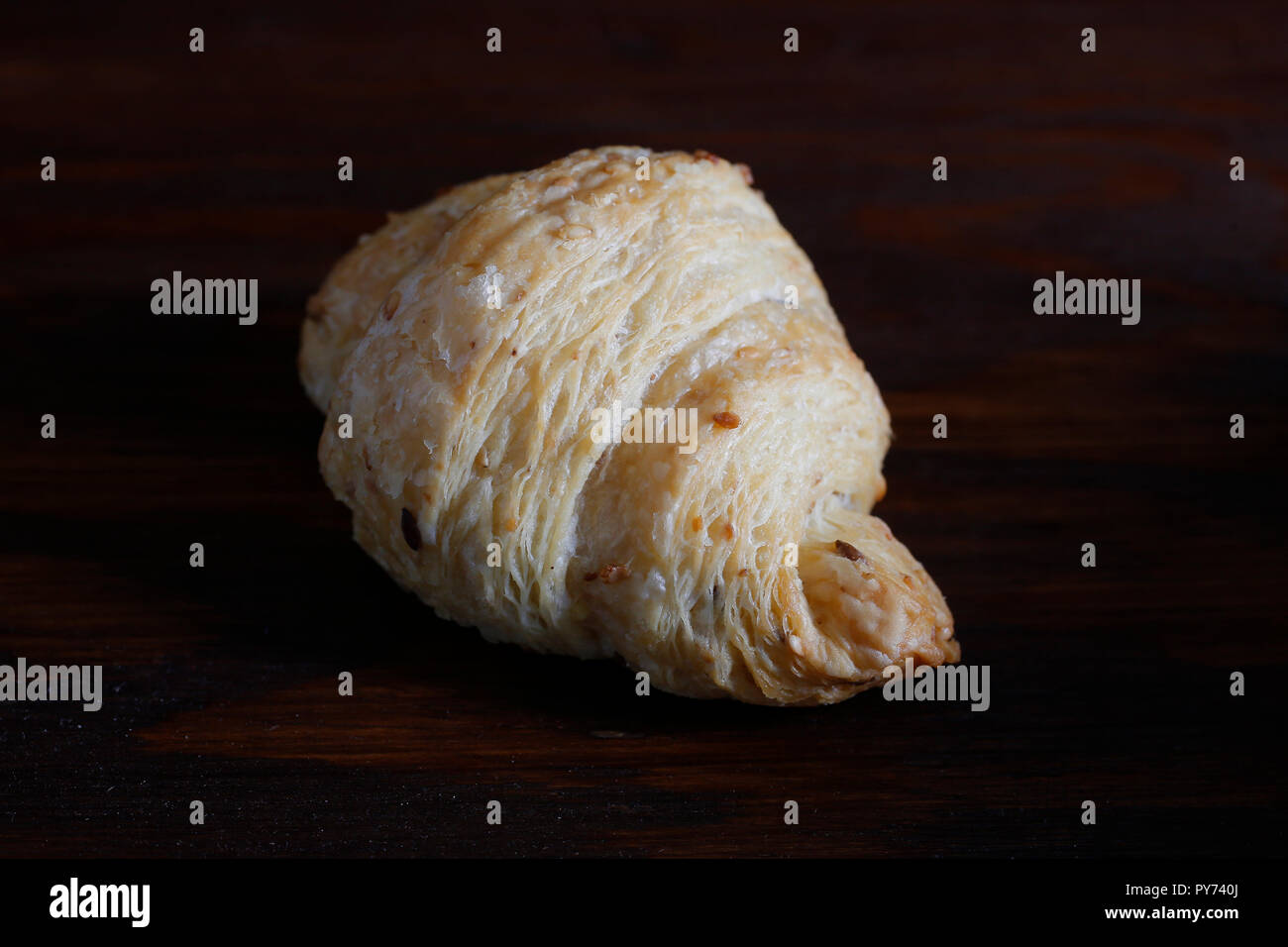 Isolated salted croissant with sesamo Stock Photo - Alamy