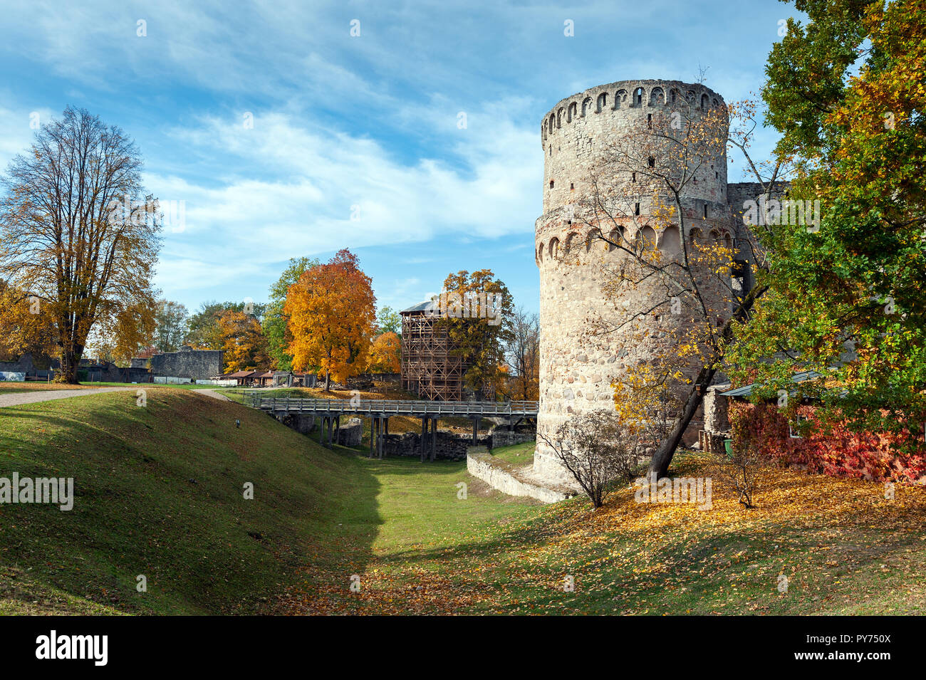 Autumn park with ruins of medieval castle in Cesis town, Latvia Stock ...
