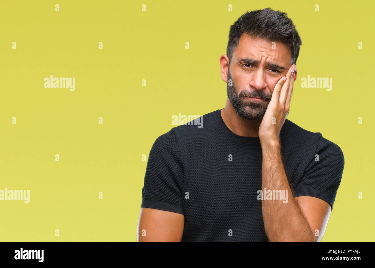 Adult hispanic man over isolated background thinking looking tired and ...