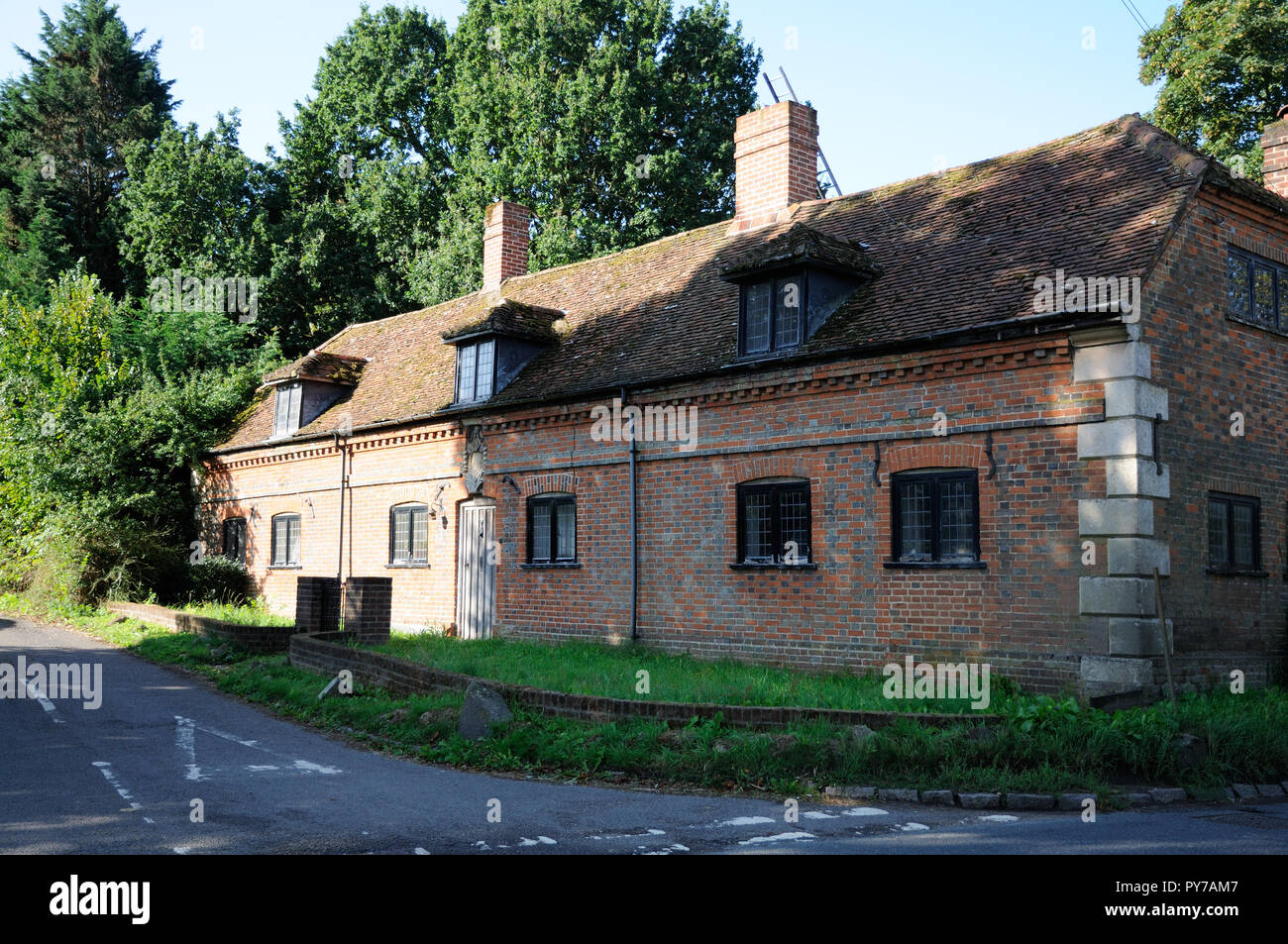 Brick almshouses, Cottered,Hertfordshire, were built in the eighteenth ...