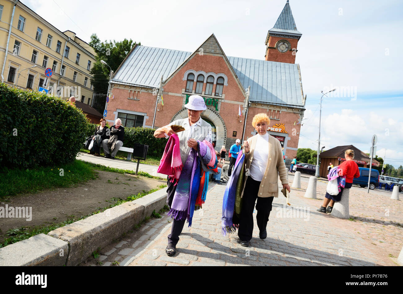 Russian woman selling products to tourists. Vyborg, Vyborgsky District ...