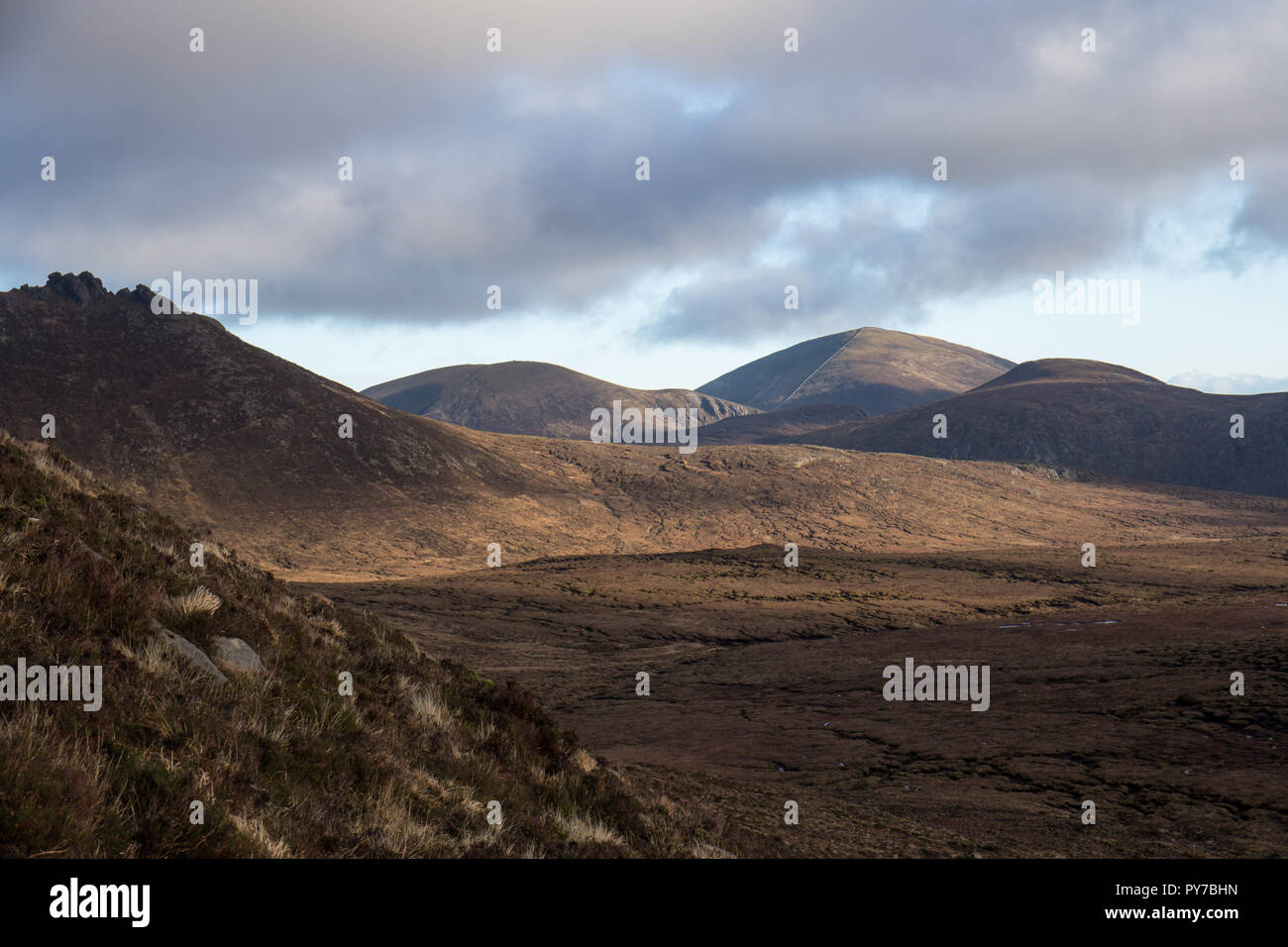 View over peat hags to (L-R) Slieve Bearnagh, Slieve Commedagh, Slieve ...
