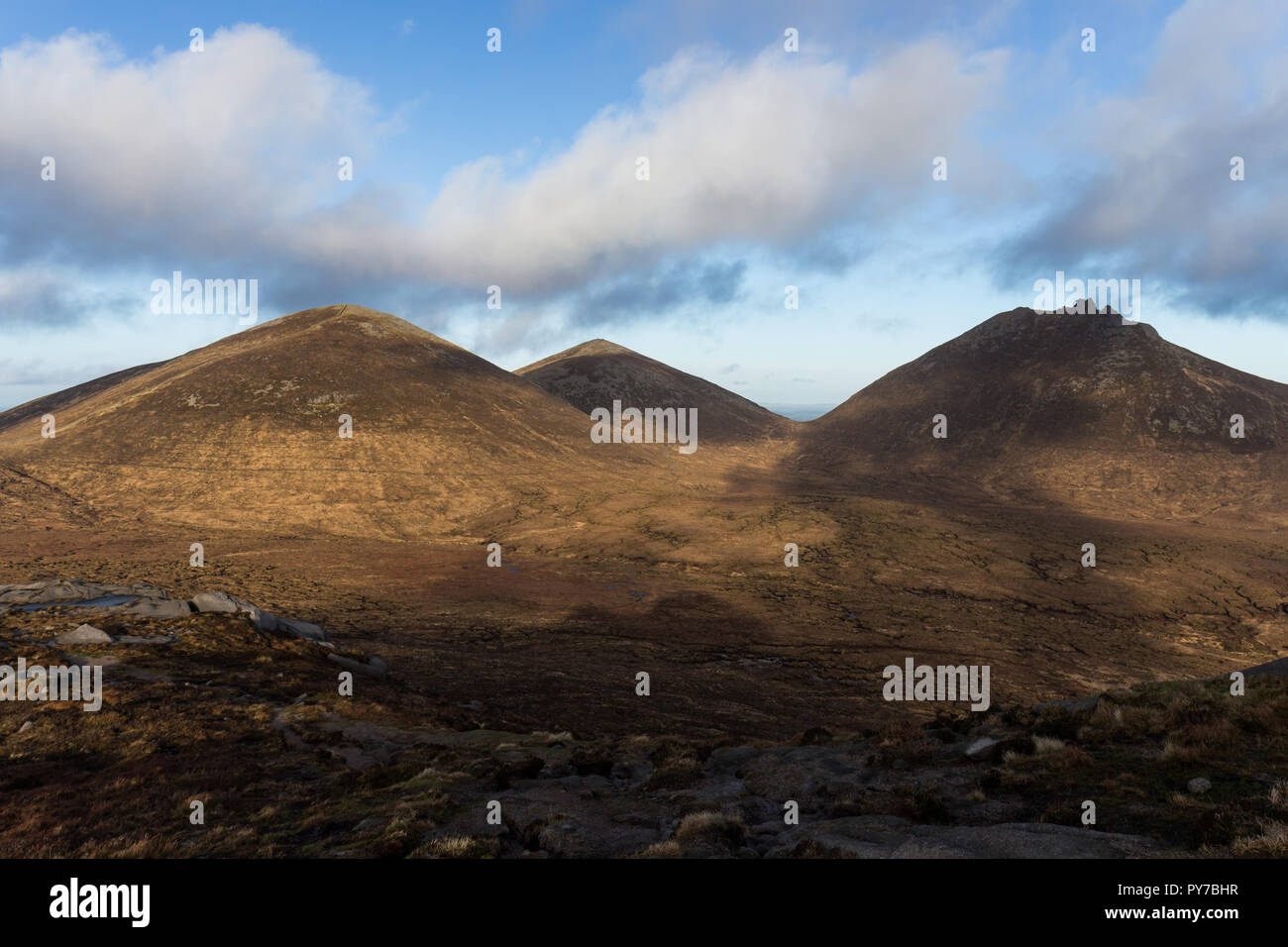 View over peat hags to (L-R) Slieve Meelbeg, Slieve Meelmore, Slieve ...