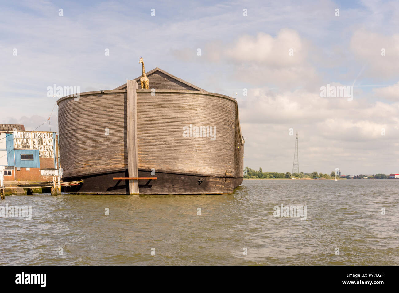 Netherlands, Rotterdam, a wooden Noah's Ark boat in a body of water ...
