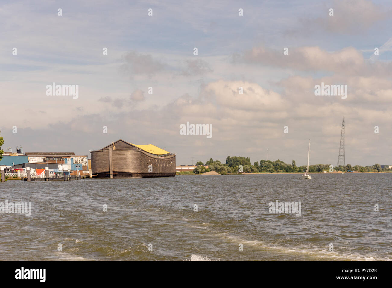 Netherlands, Rotterdam, a wooden Noah's Ark boat in a body of water ...