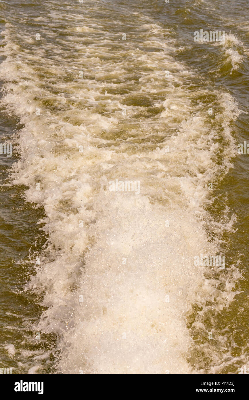 Netherlands, Rotterdam, water jet stream behind a boat Stock Photo - Alamy