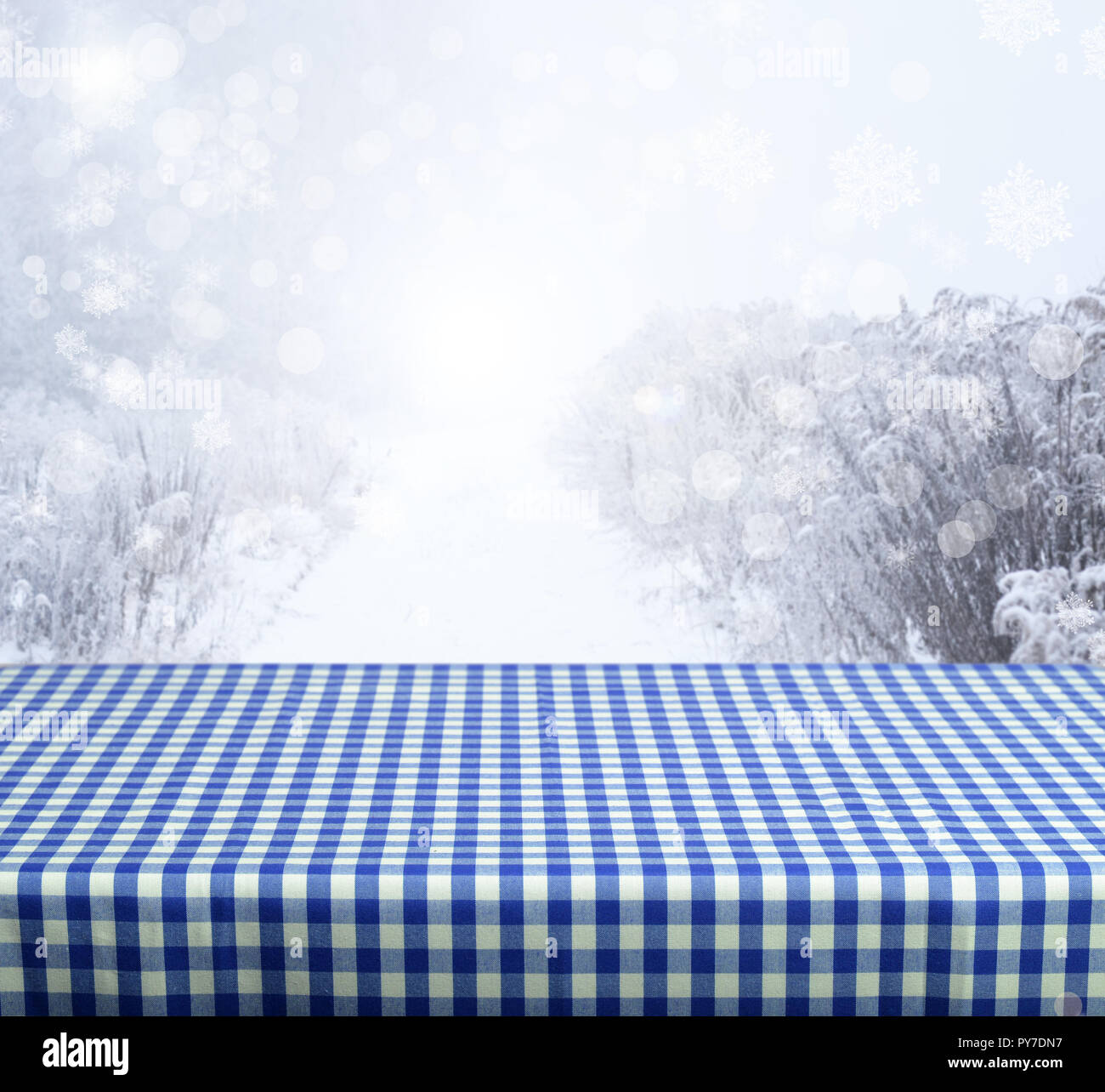 Empty blue table with winter background. Ready for product display ...