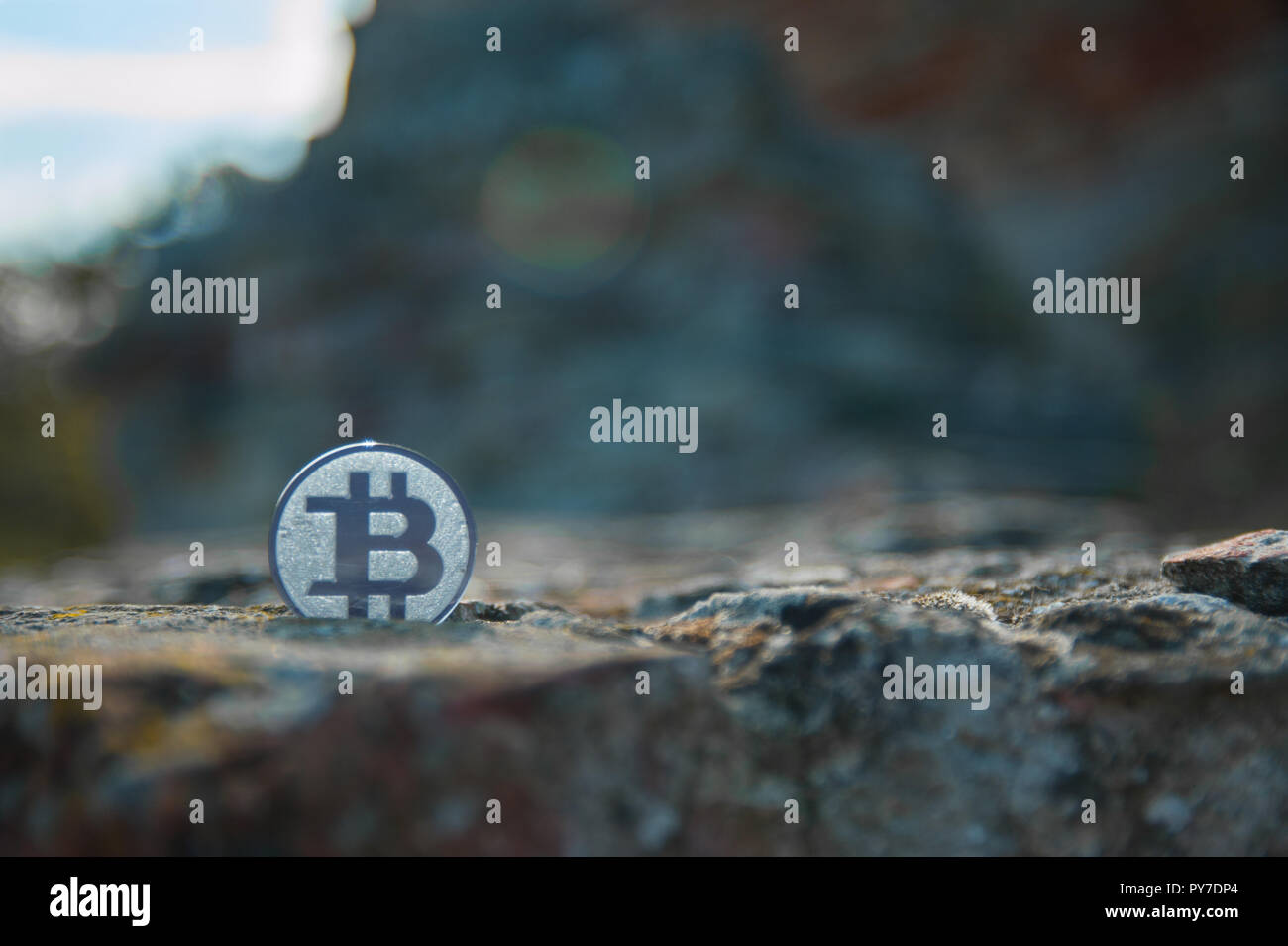 Bit coin on the old stone and brick wall Stock Photo - Alamy