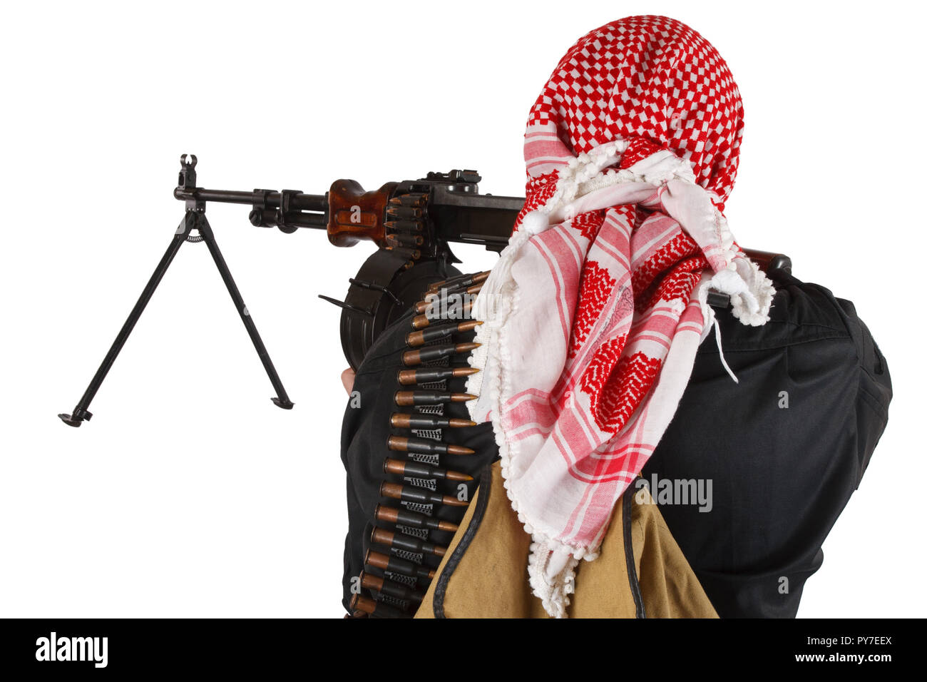 Rebel army soldier in black uniform with red kufiya holding machine gun ...
