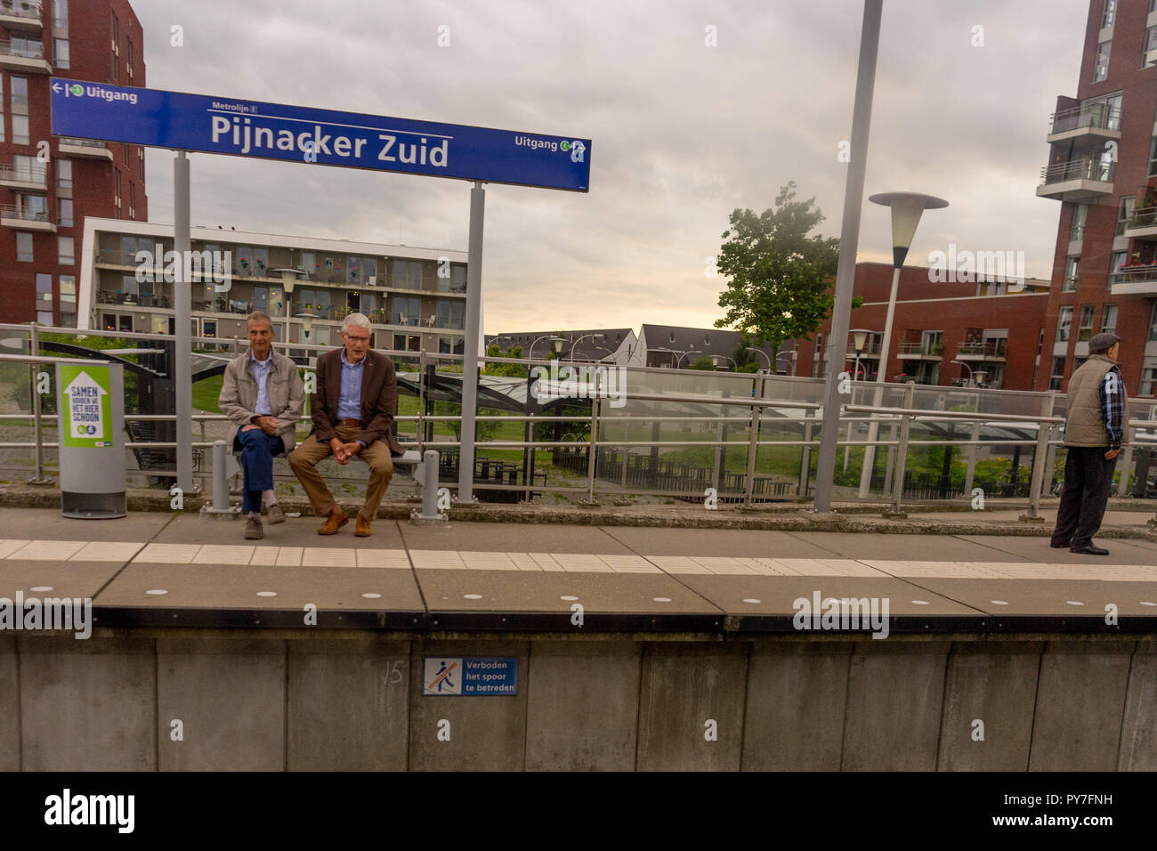 Rotterdam, Netherlands - 16 July, 2016: Old people sitting on a bench ...