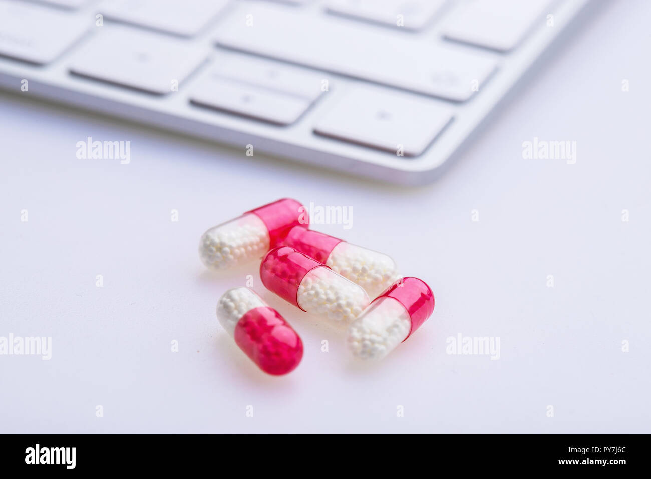 Medical concept with medicines and laptop computer hi-res stock ...