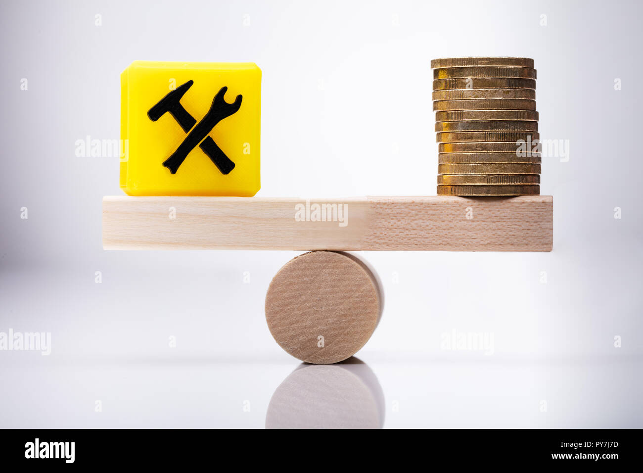 Yellow Under Construction Icon Cubic Block And Stacked Coins Balancing ...