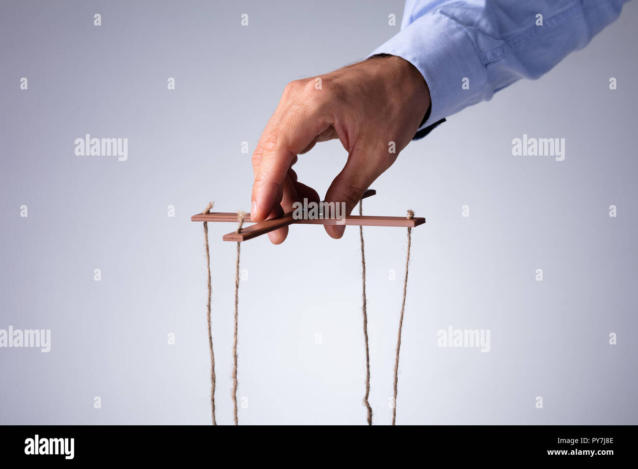 Person manipulated puppet hi-res stock photography and images - Alamy