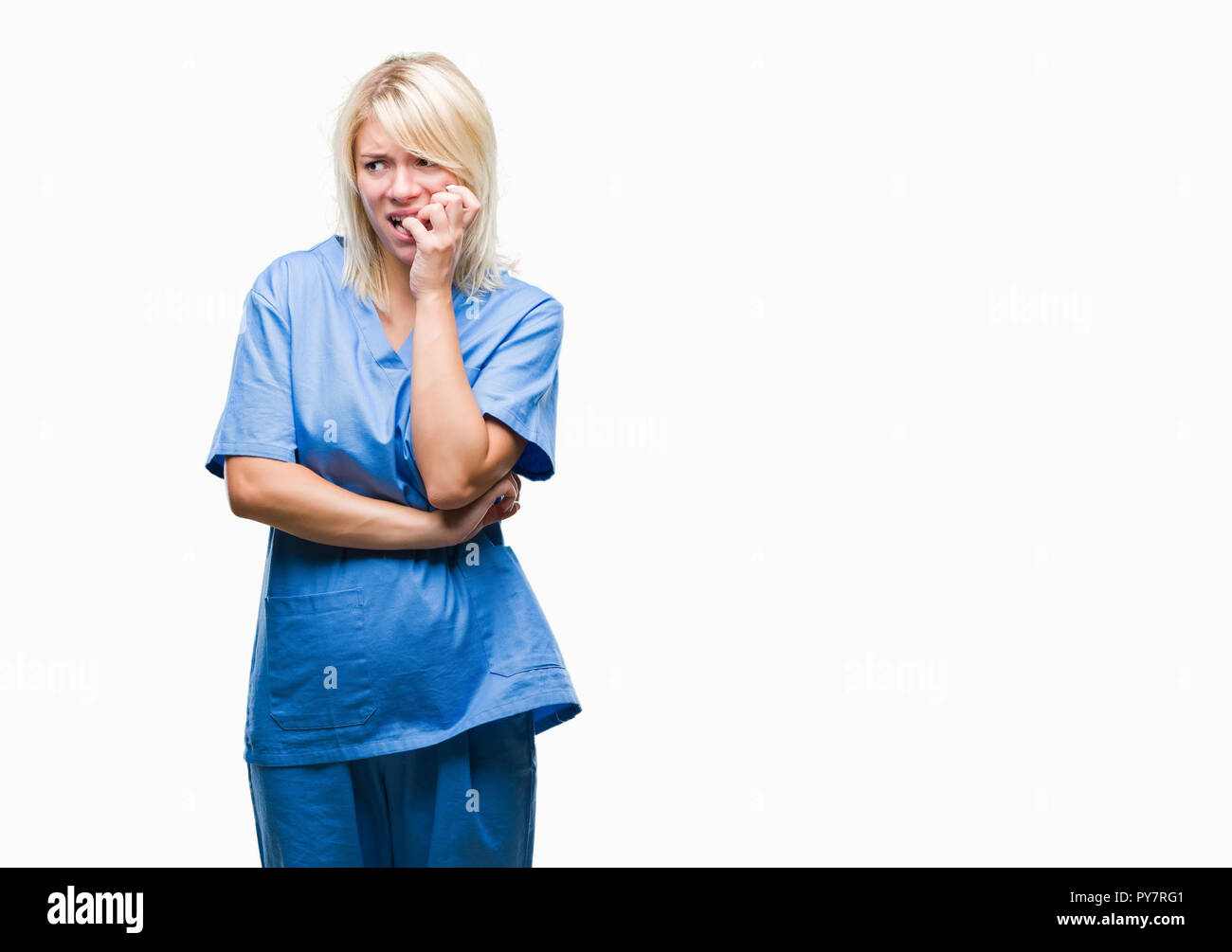 Young beautiful blonde nurse doctor woman over isolated background ...