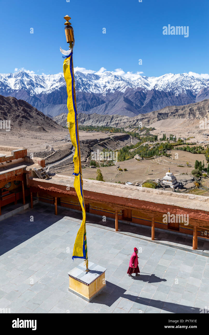 An elderly woman passing the courtyard of Likir Monastery or Likir ...