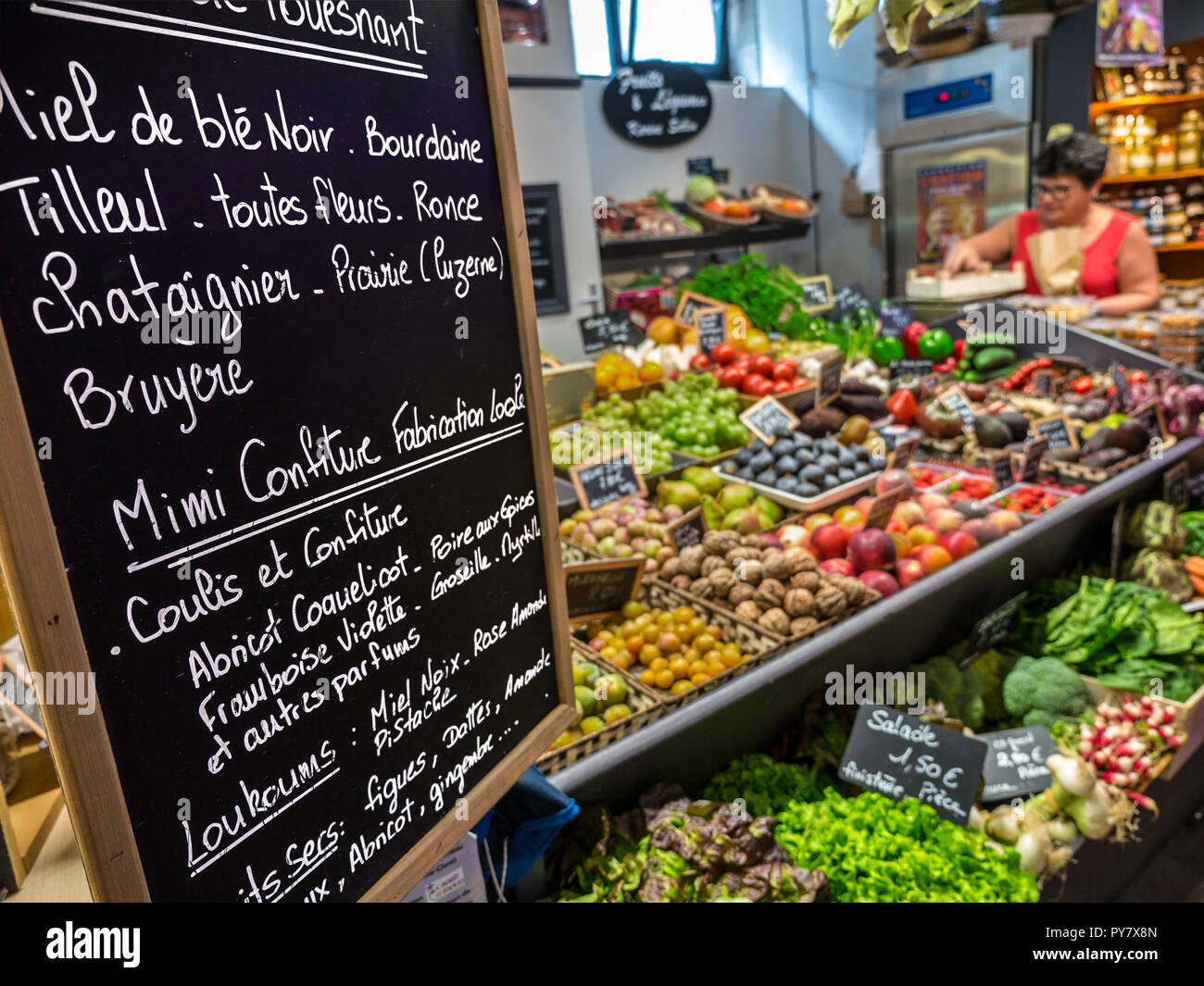 CONCARNEAU fruit and vegetable market stall display & grocer with daily ...