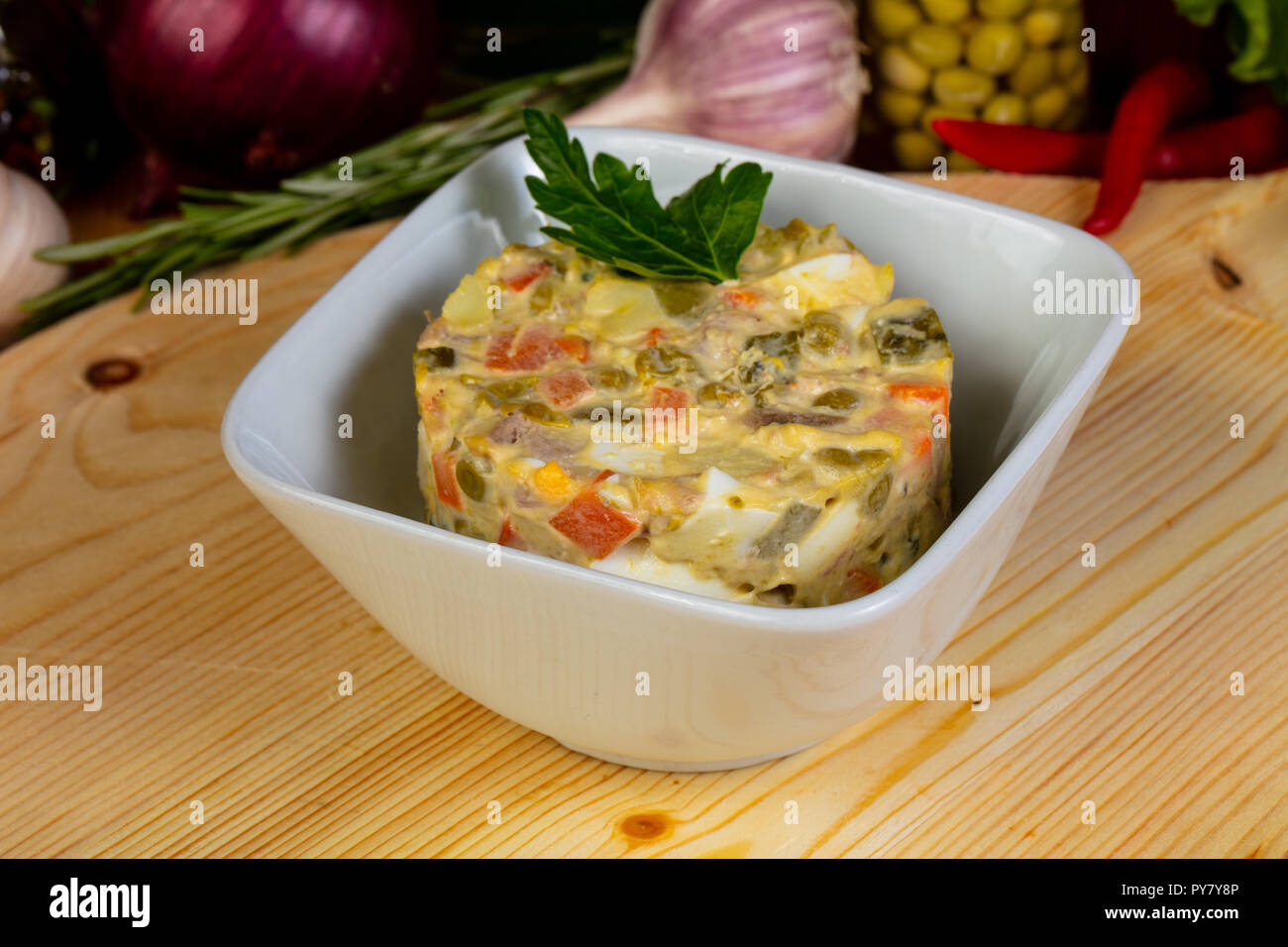 Traditional Russian salad served parsley Stock Photo - Alamy